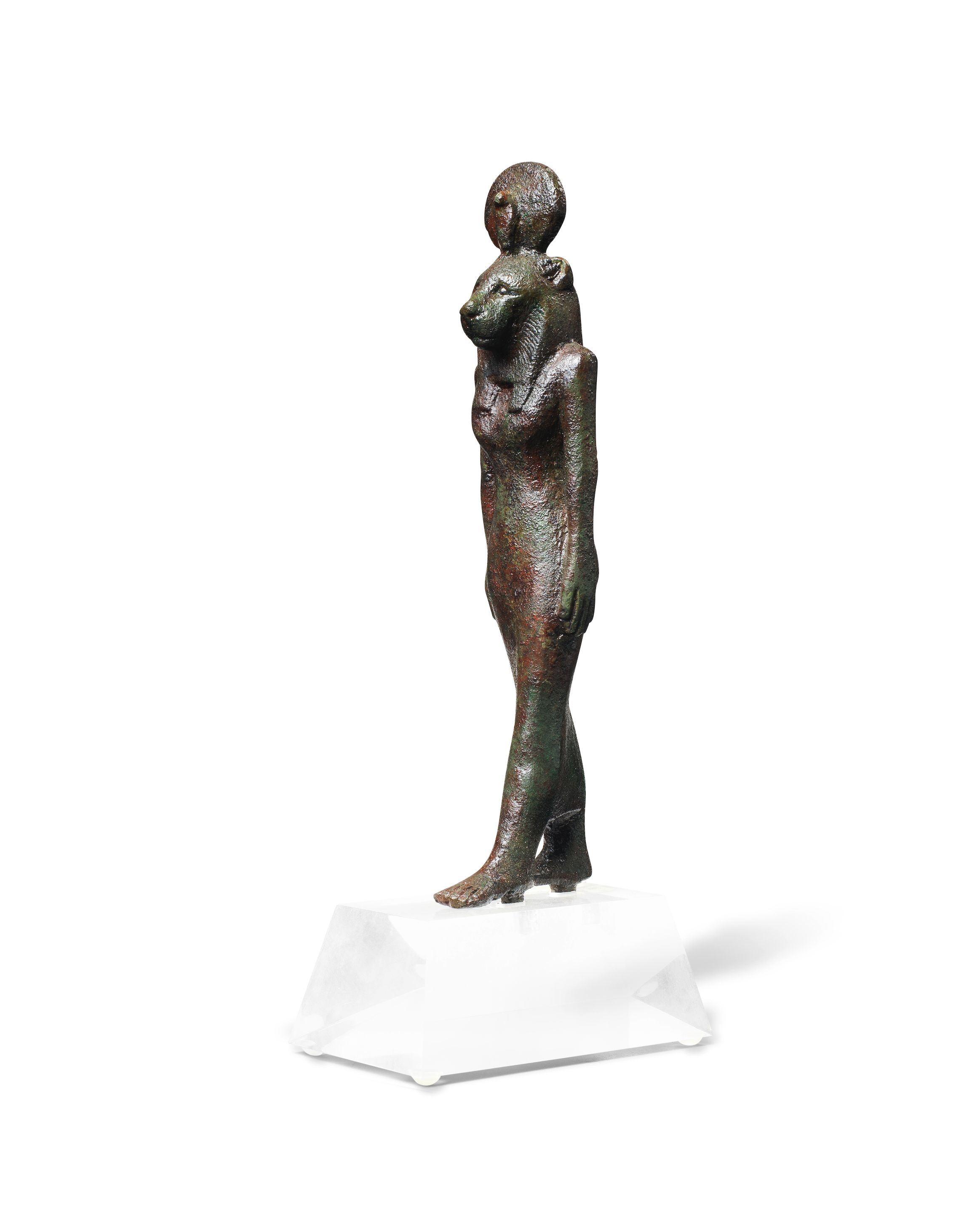 Egyptian School | An Egyptian bronze striding Wadjet (Circa 66) | MutualArt